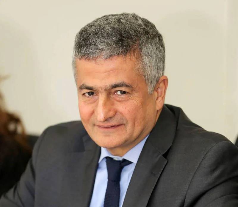 Demonstrators gather at Finance Minister Yousef Khalil's residence to call out his obstruction ...