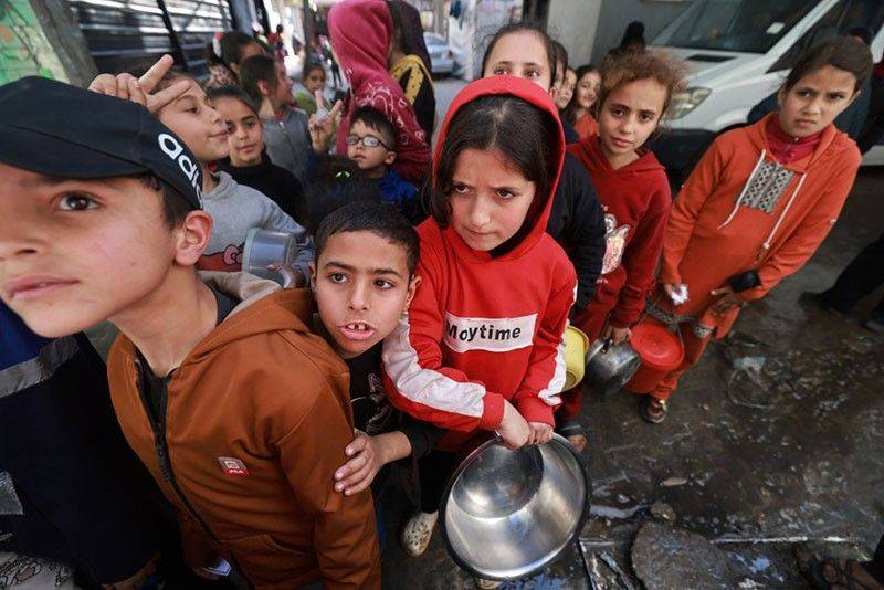 Starvation in Gaza could be a 'war crime' UN human rights chief tells ...