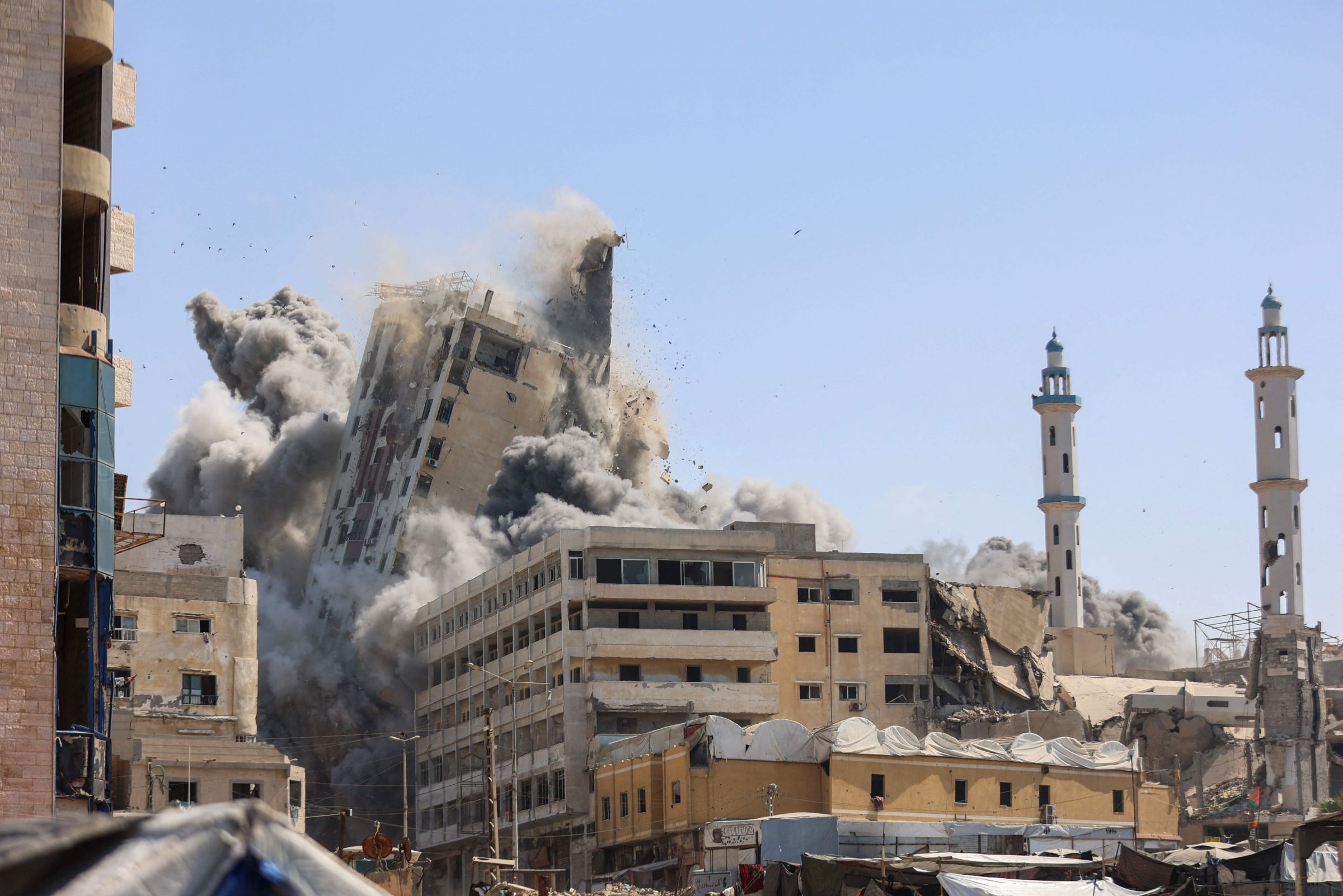 After destroying Gaza's tallest tower, Israel expands its invasion into ...